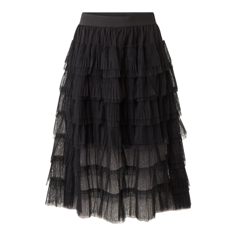 5 stijlvolle manieren om een gebreid vest te dragen deze herfst