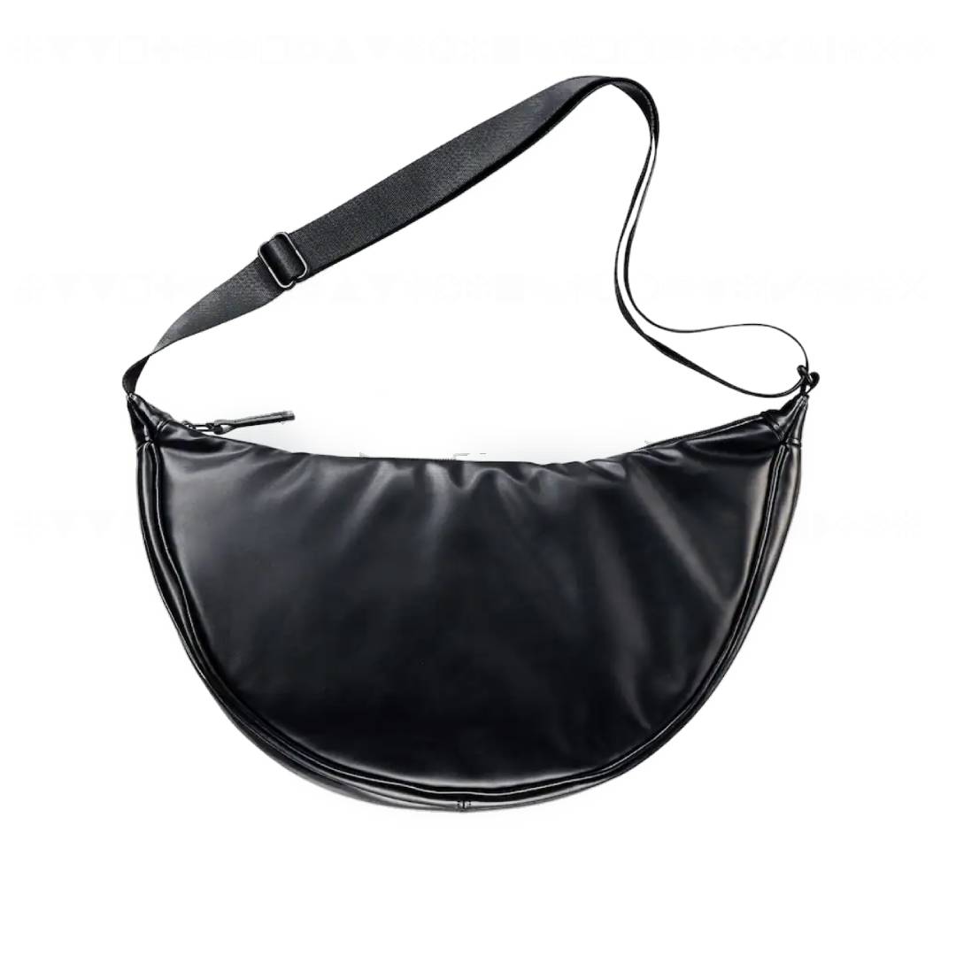 Waarom je de halve maan-tas wil toevoegen aan je look