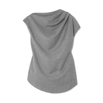 De gedrapeerde top is dit seizoen het chicste stuk in je garderobe