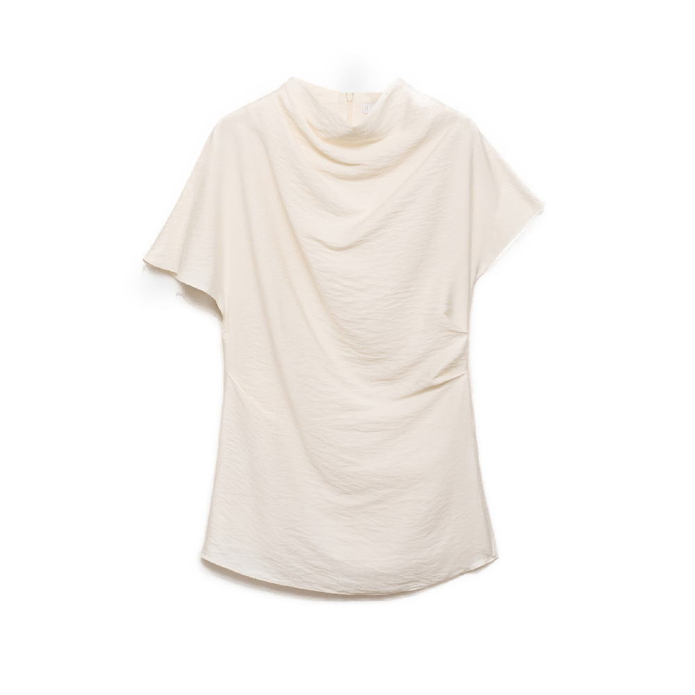 De gedrapeerde top is dit seizoen het chicste stuk in je garderobe